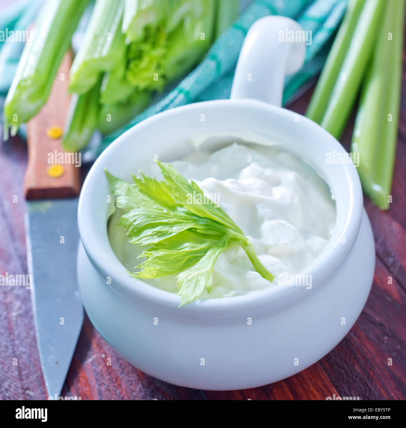 fresh celery and white sauce Stock Photo - Alamy