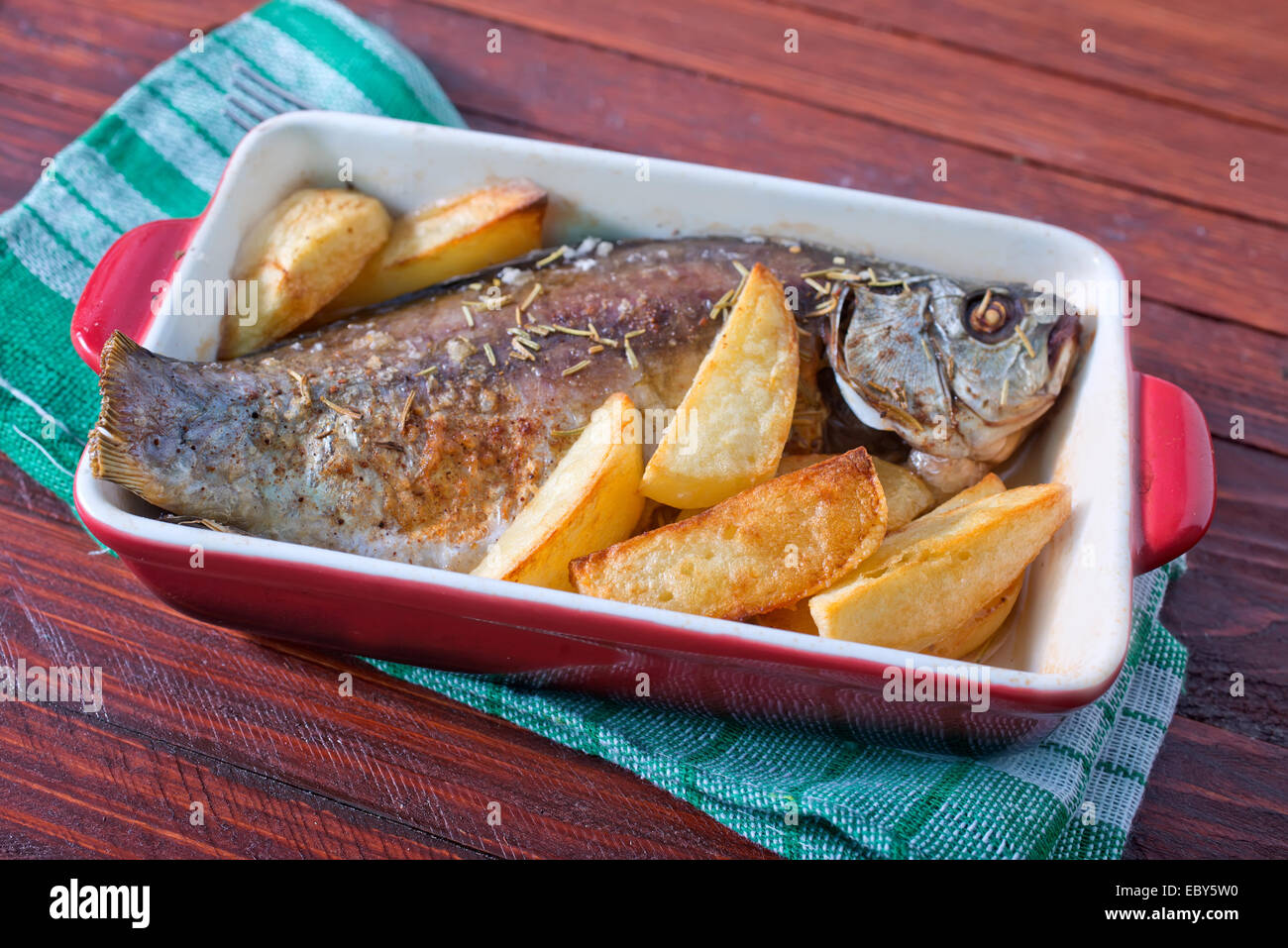 baked fish and potato Stock Photo - Alamy