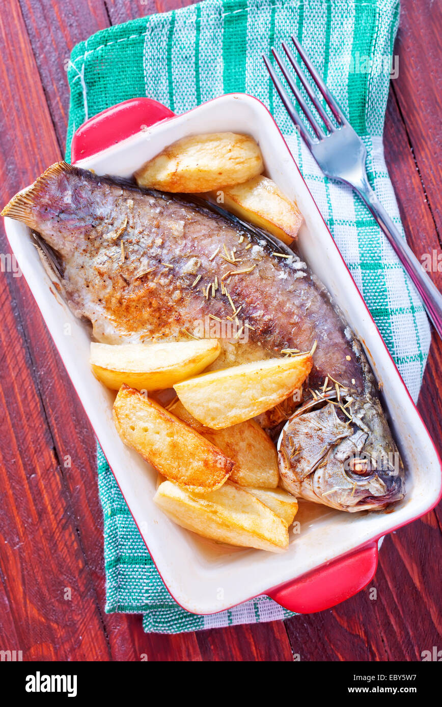 baked fish and potato Stock Photo - Alamy