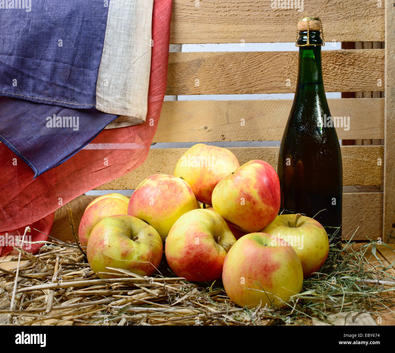 bottle of cider apples in the straw with French flag Stock Photo - Alamy