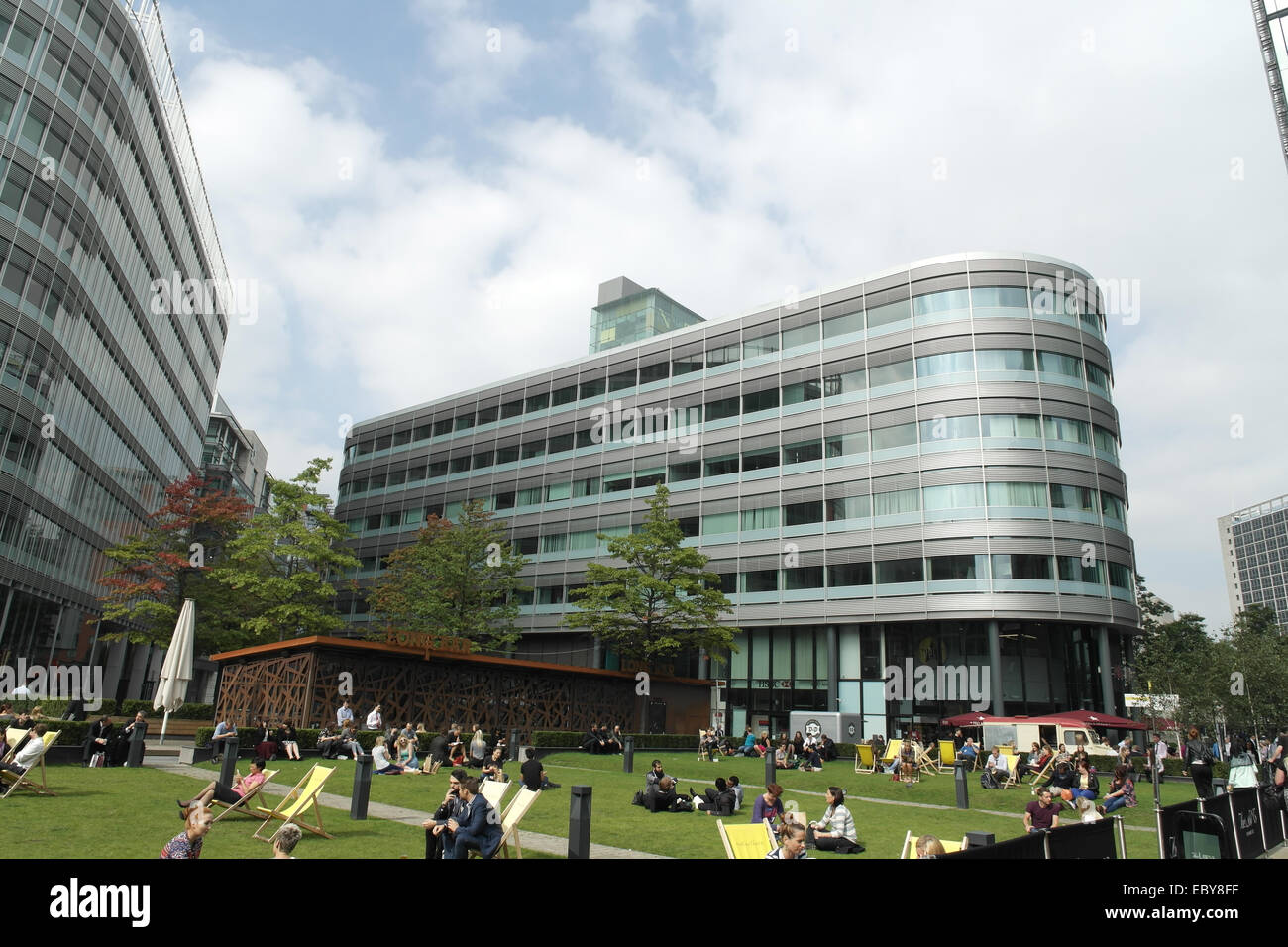 Sunny view, towards 4 Hardman Square building, people sitting deck ...