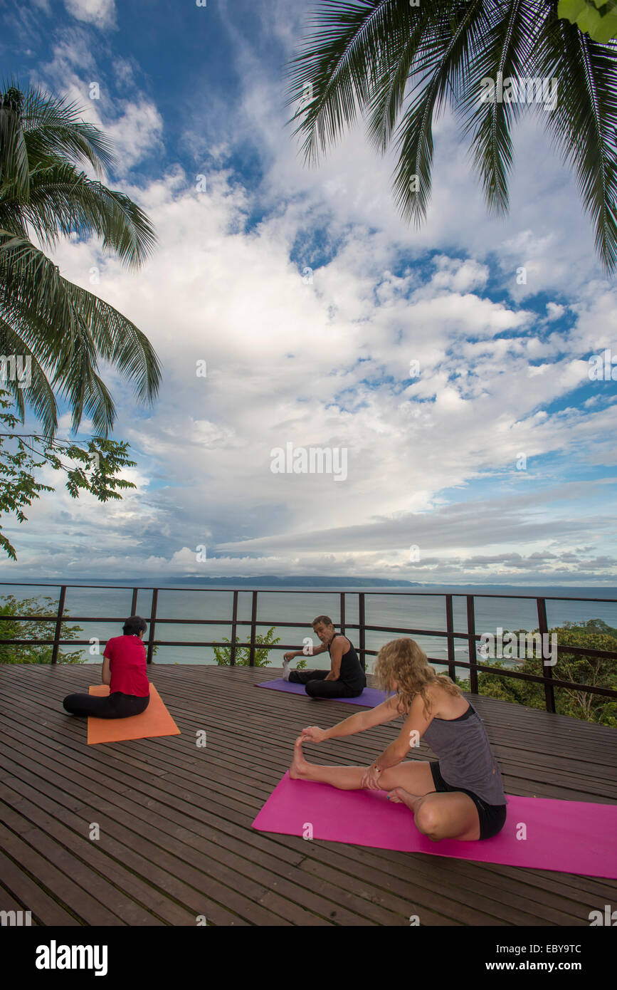 Doing yoga in Costa Rica Stock Photo - Alamy