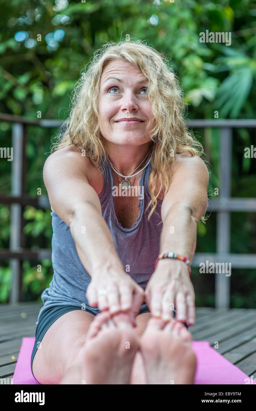 Doing yoga in Costa Rica Stock Photo - Alamy