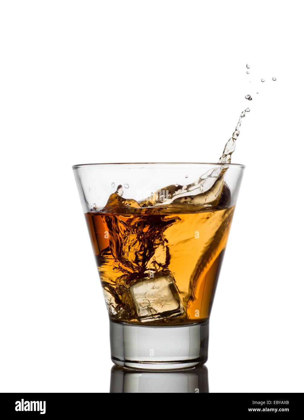 Isolated shots of whiskey with splash on white Stock Photo - Alamy