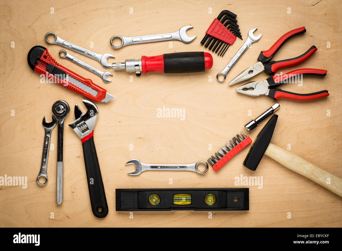 Set of tools on a wood panel Stock Photo - Alamy