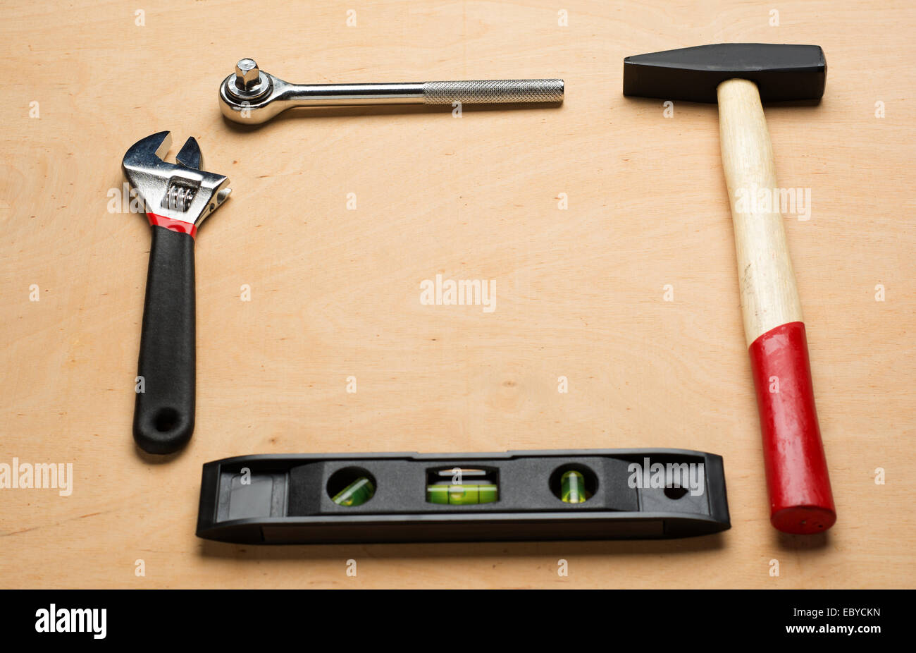 Set of tools on a wood panel Stock Photo - Alamy