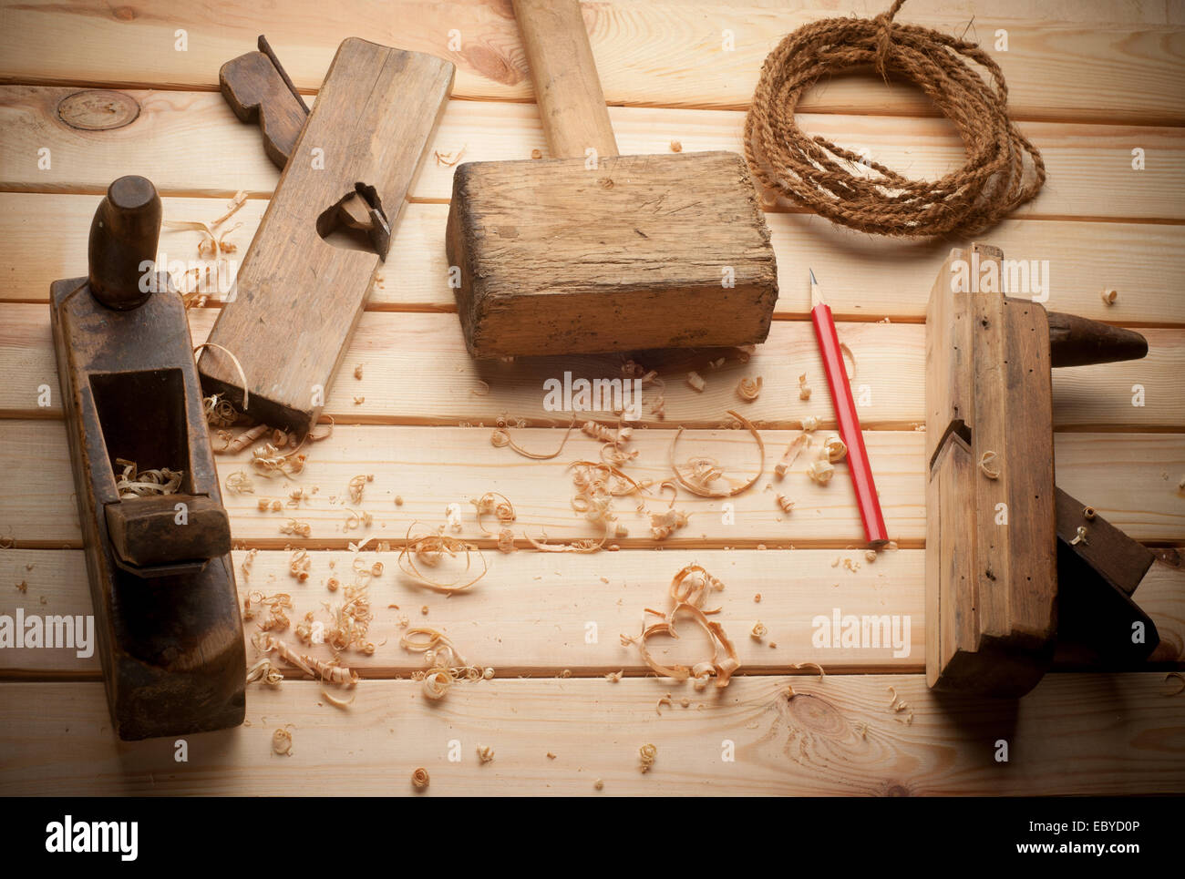 carpenter tools in pine wood table Stock Photo - Alamy