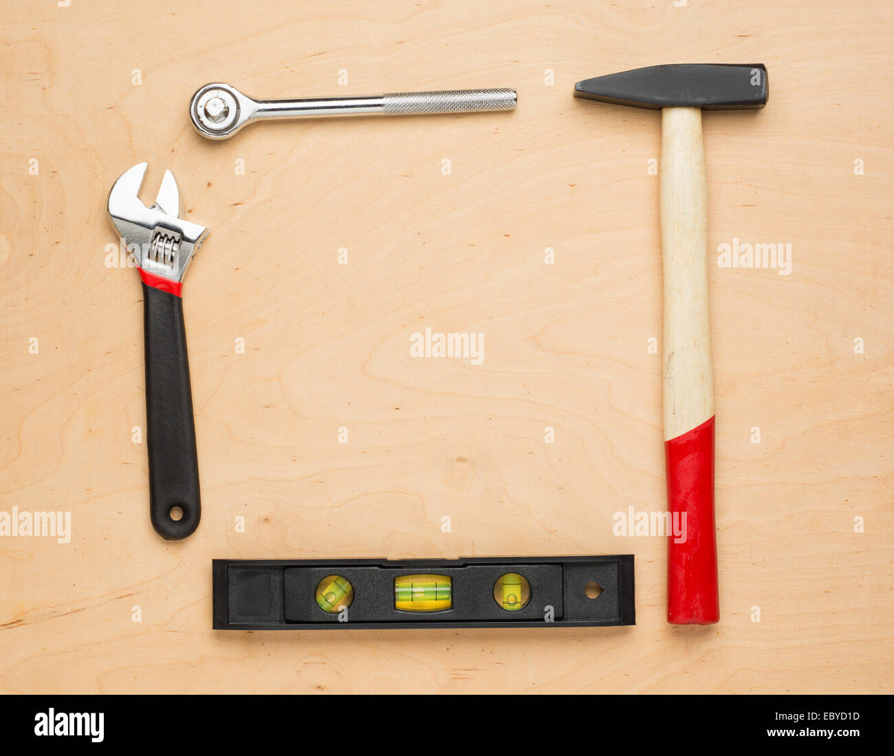 Set of tools on a wood panel Stock Photo - Alamy