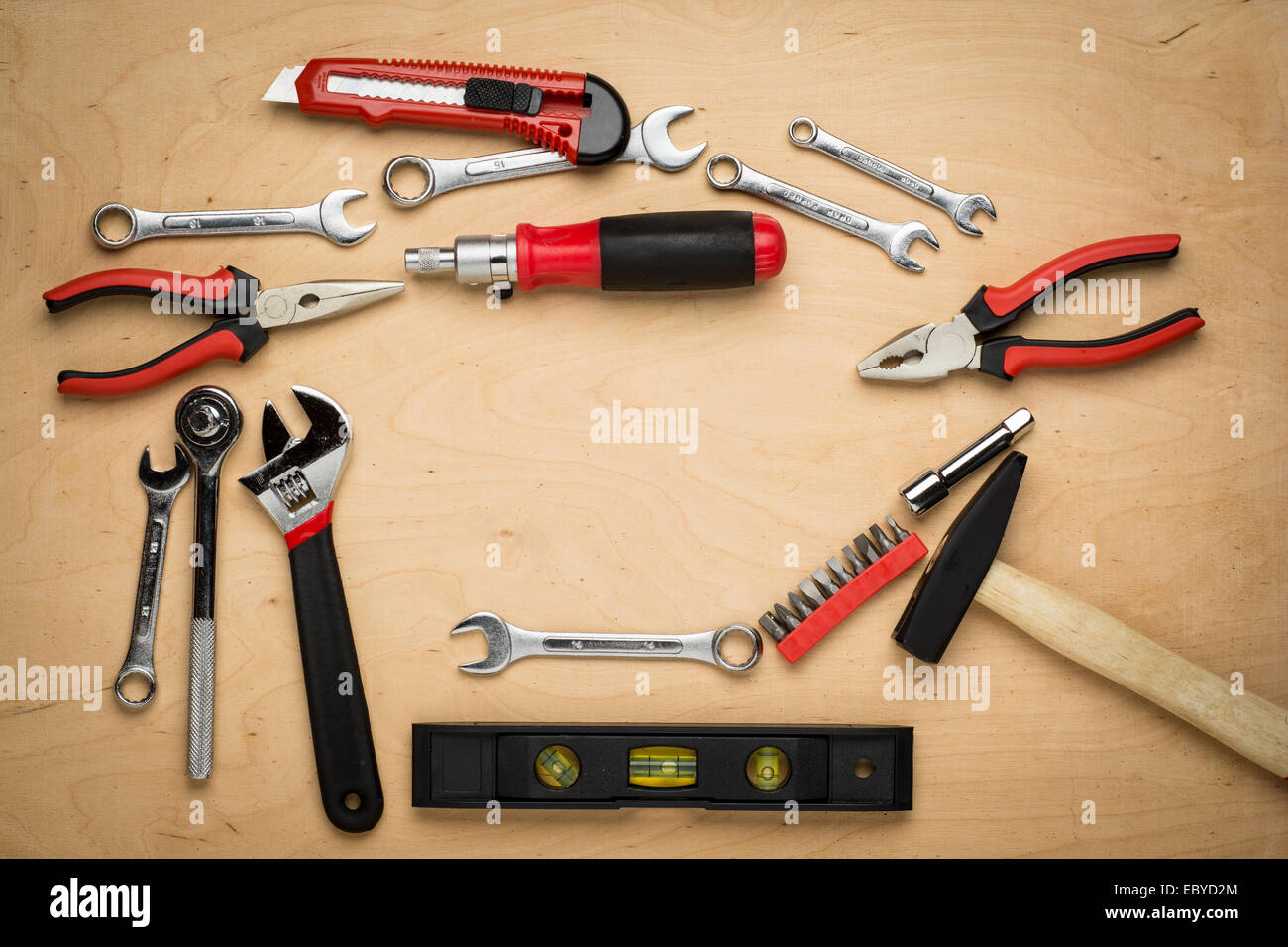 Set of tools on a wood panel Stock Photo - Alamy