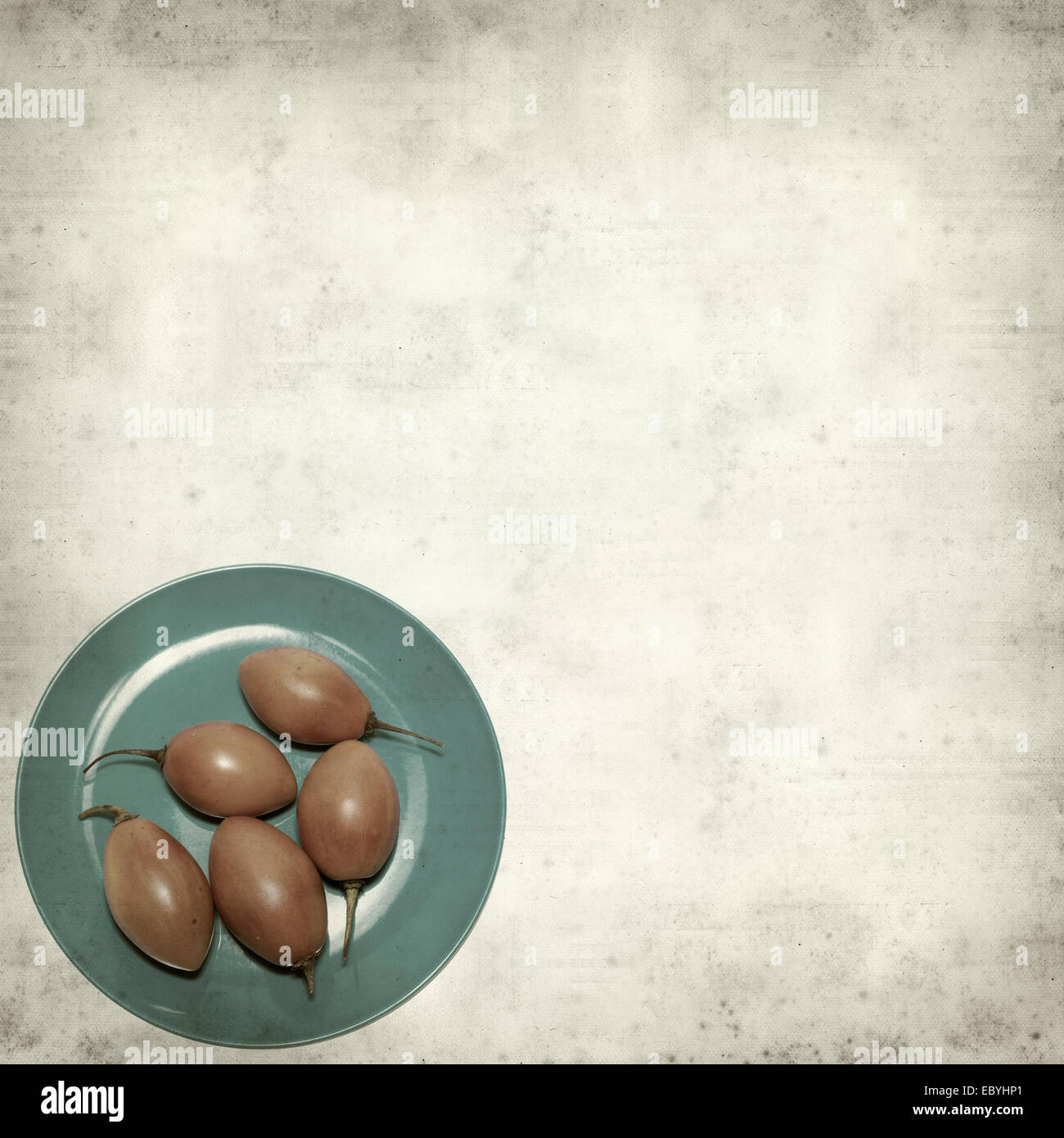 textured old paper background with tree tomato fruit Stock Photo - Alamy