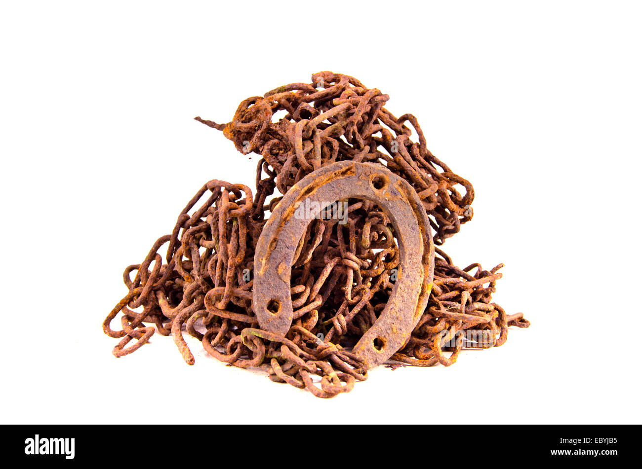 rusty iron metal scrap isolated on white background. Horseshoe and ...