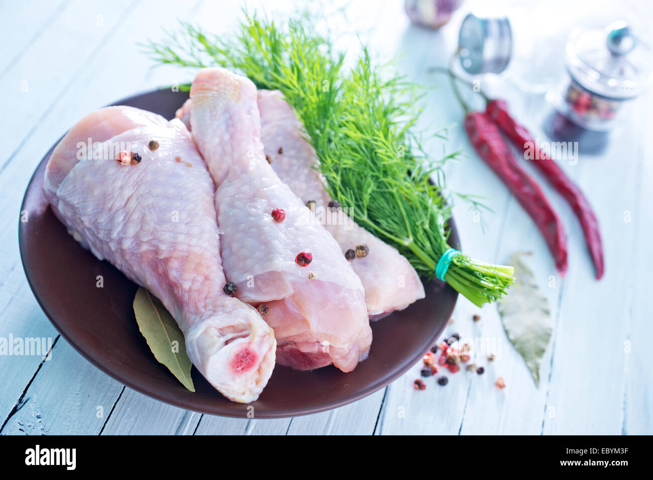 raw chicken legs Stock Photo - Alamy