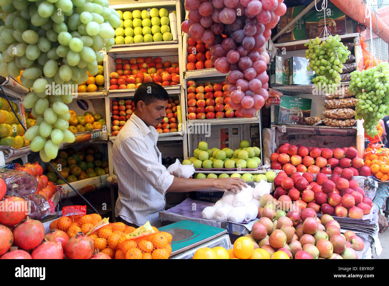 Dhaka 05 December 2014. Fruit vendor at Chwak Bazar in Old Dhaka, The capital city of Bangladesh ...