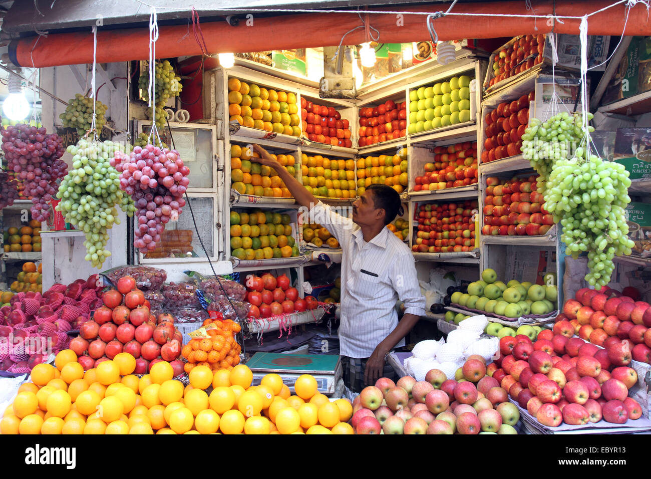 Dhaka 05 December 2014. Fruit vendor at Chwak Bazar in Old Dhaka, The capital city of Bangladesh ...