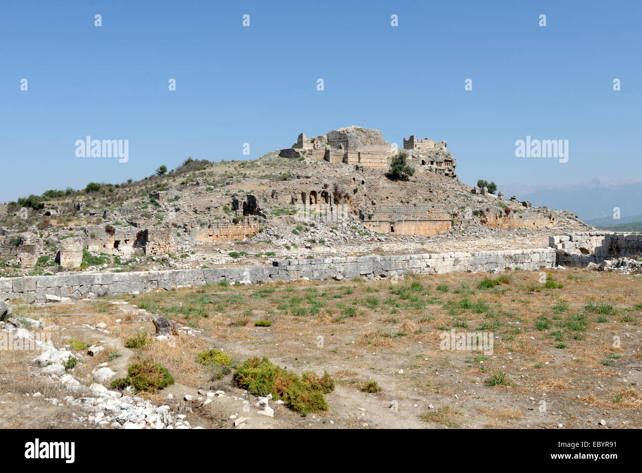 View of the Acropolis, over the retaining wall of the palestra and ...