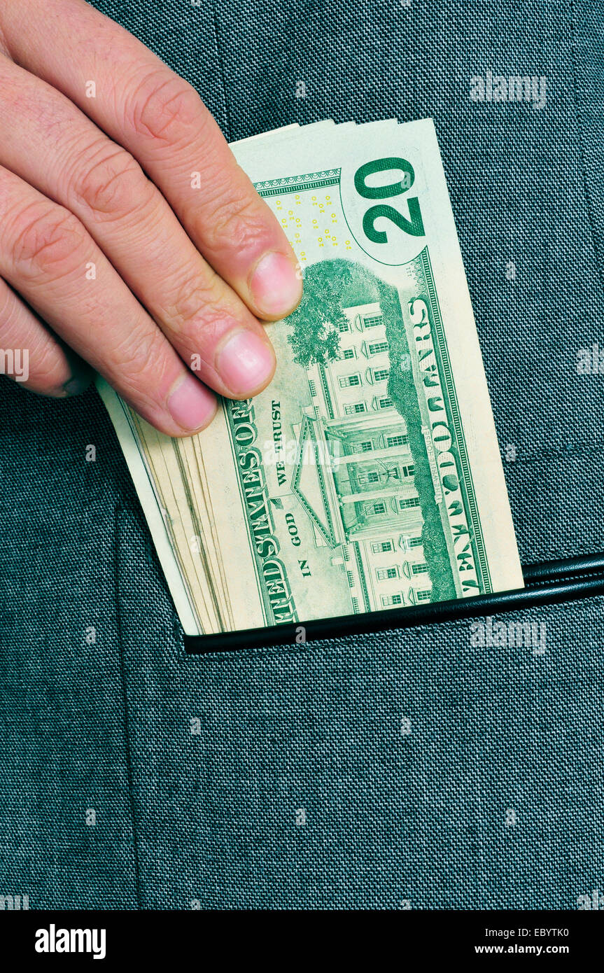 Businessman is paying in dollar bills hi-res stock photography and ...