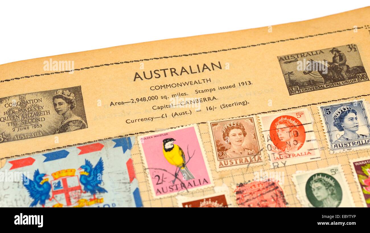 An old fully illustrated stamp album with stamps from Australia Stock ...