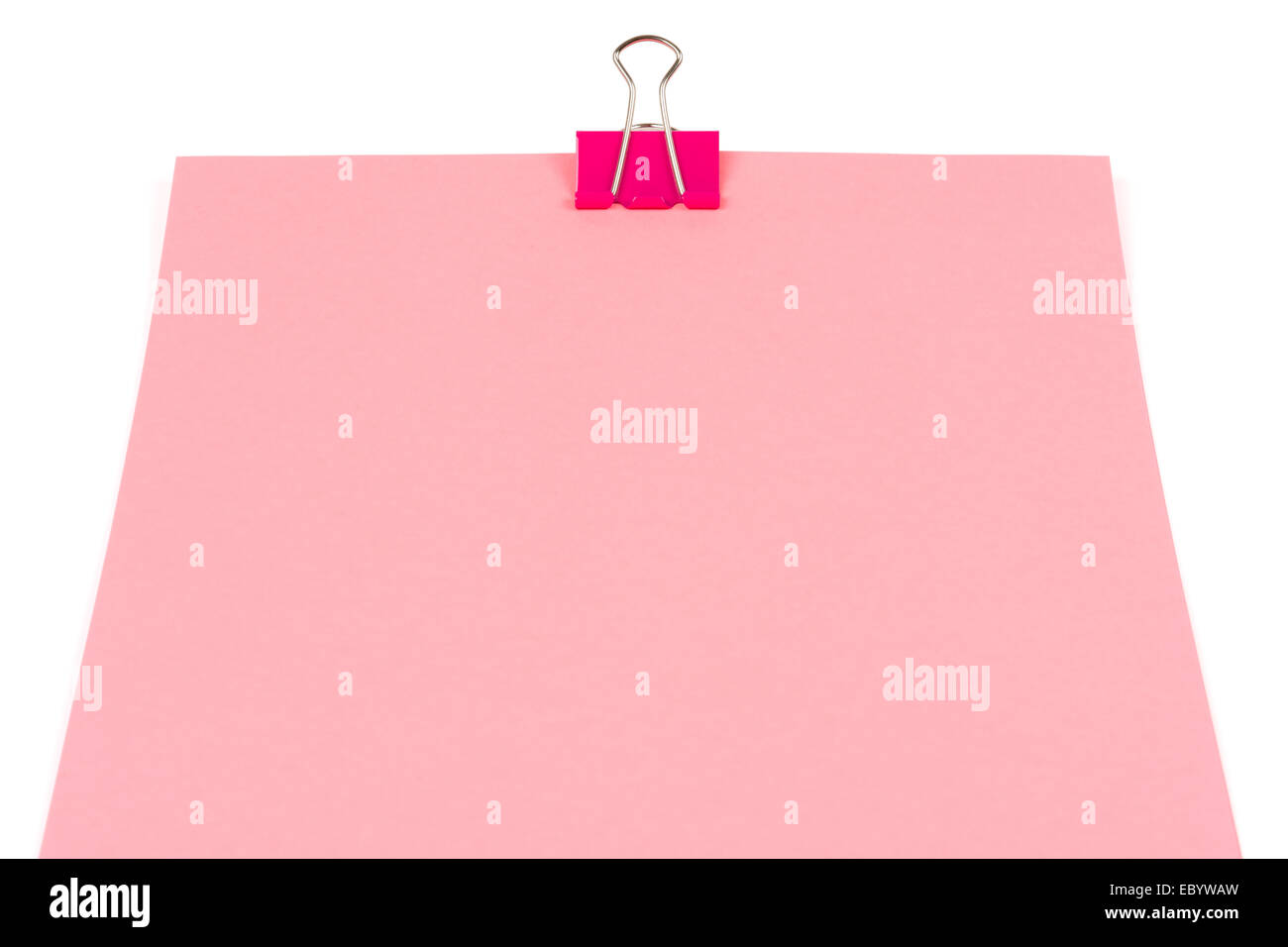 Stack of pink office paper clipped by pink binder Stock Photo - Alamy