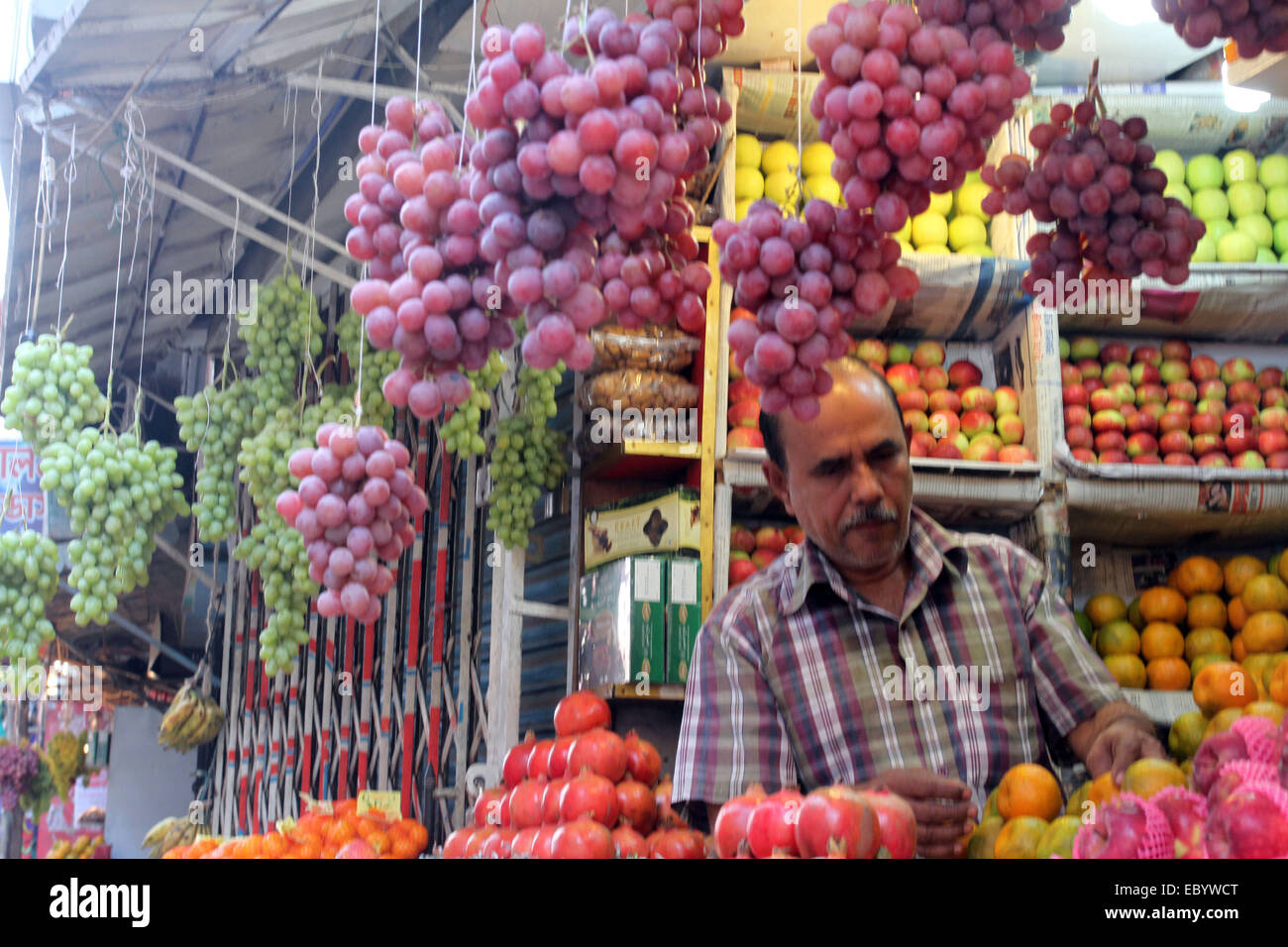 Dhaka 05 December 2014. Fruit vendor at Chwak Bazar in Old Dhaka, The capital city of Bangladesh ...