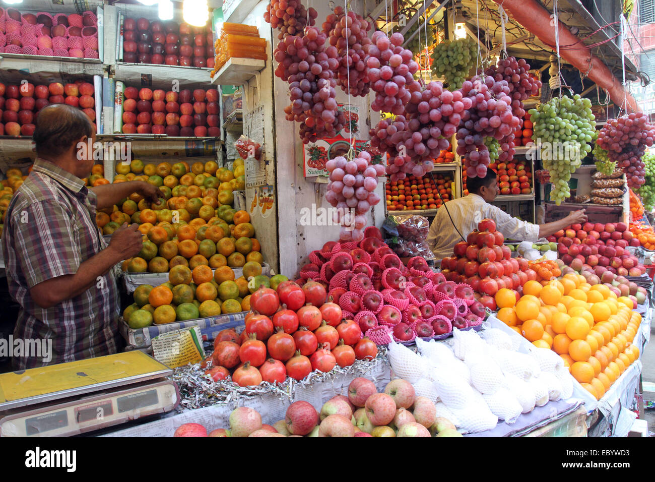 Dhaka 05 December 2014. Fruit vendor at Chwak Bazar in Old Dhaka, The capital city of Bangladesh ...