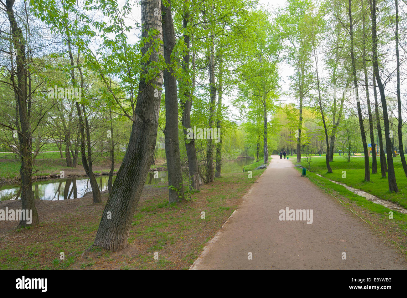 Two people walk in hi-res stock photography and images - Alamy