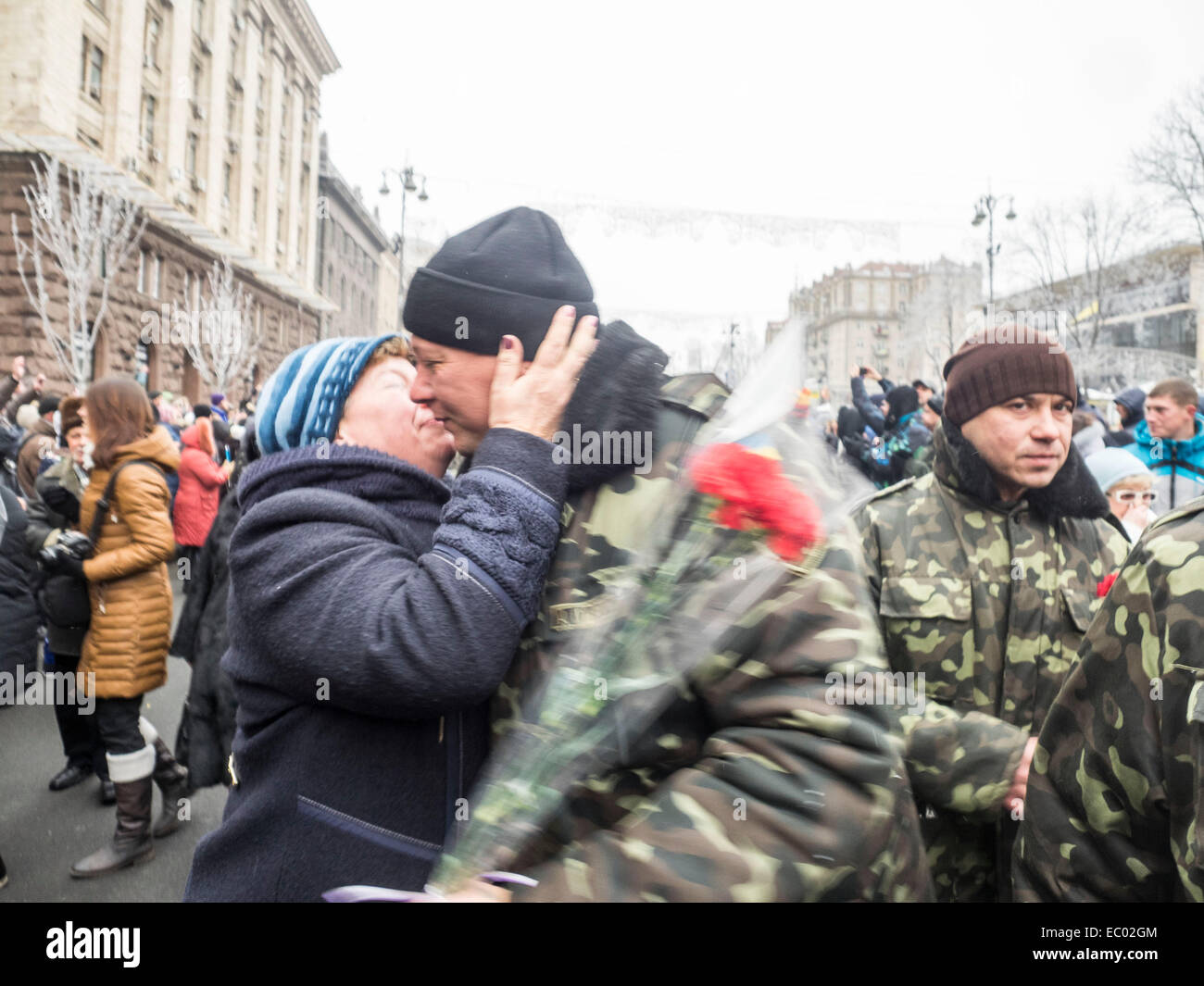 Kiev, Ukraine, 06th Dec, 2014. Woman hugging soldier from the "Kiev 12 ...
