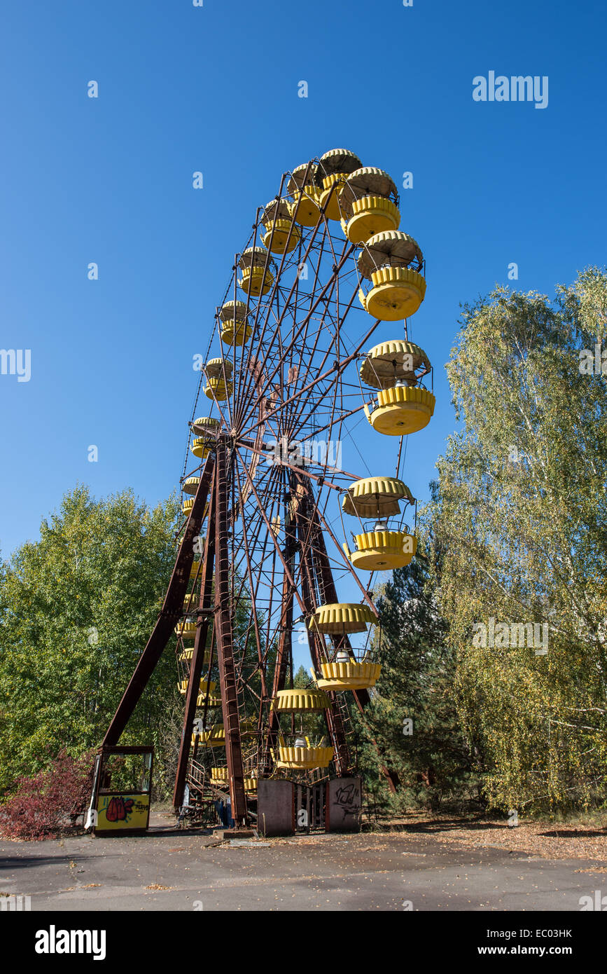 Ferris wheel in funfair in city park of Pripyat abandoned city ...