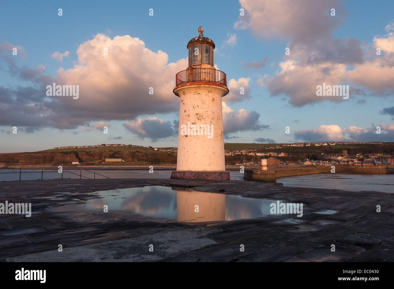 The lighthouse at the end of the breakwater at Whitehaven, Cumbria ...