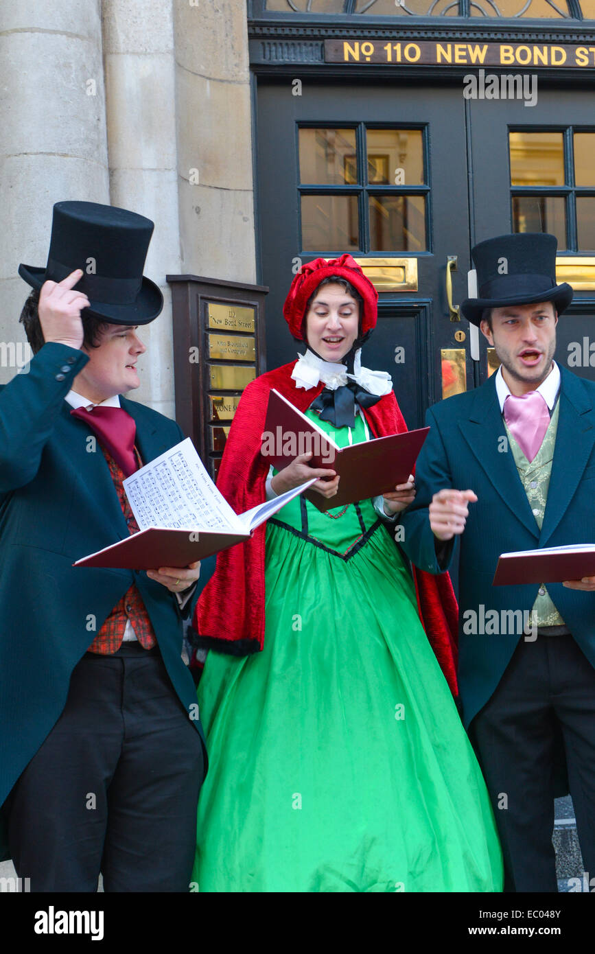 Brook Street, London, UK. 6th December 2014. Christmas Carolers in ...