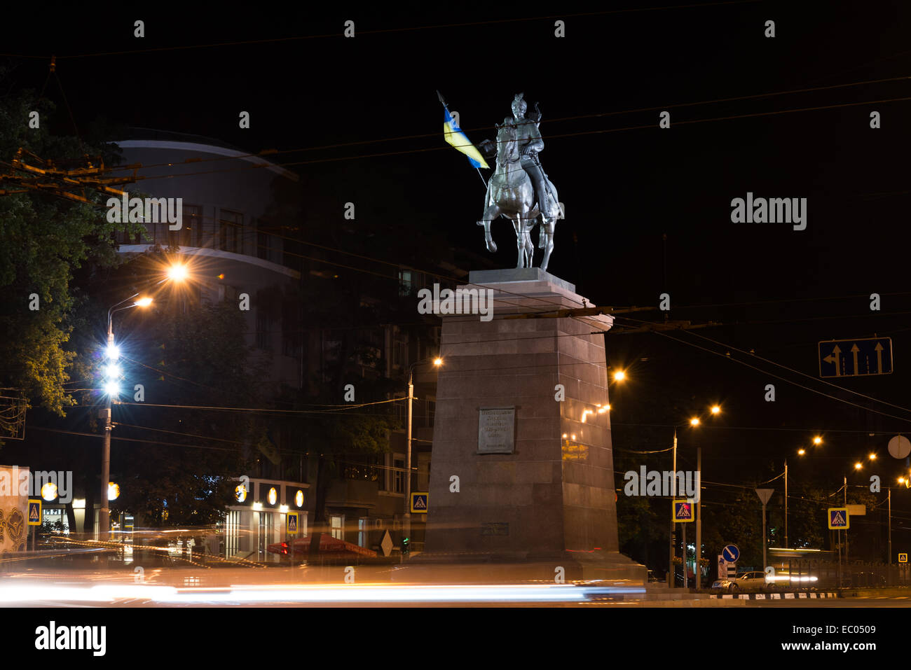 A cossack bronze statue in kharkiv by night Stock Photo - Alamy