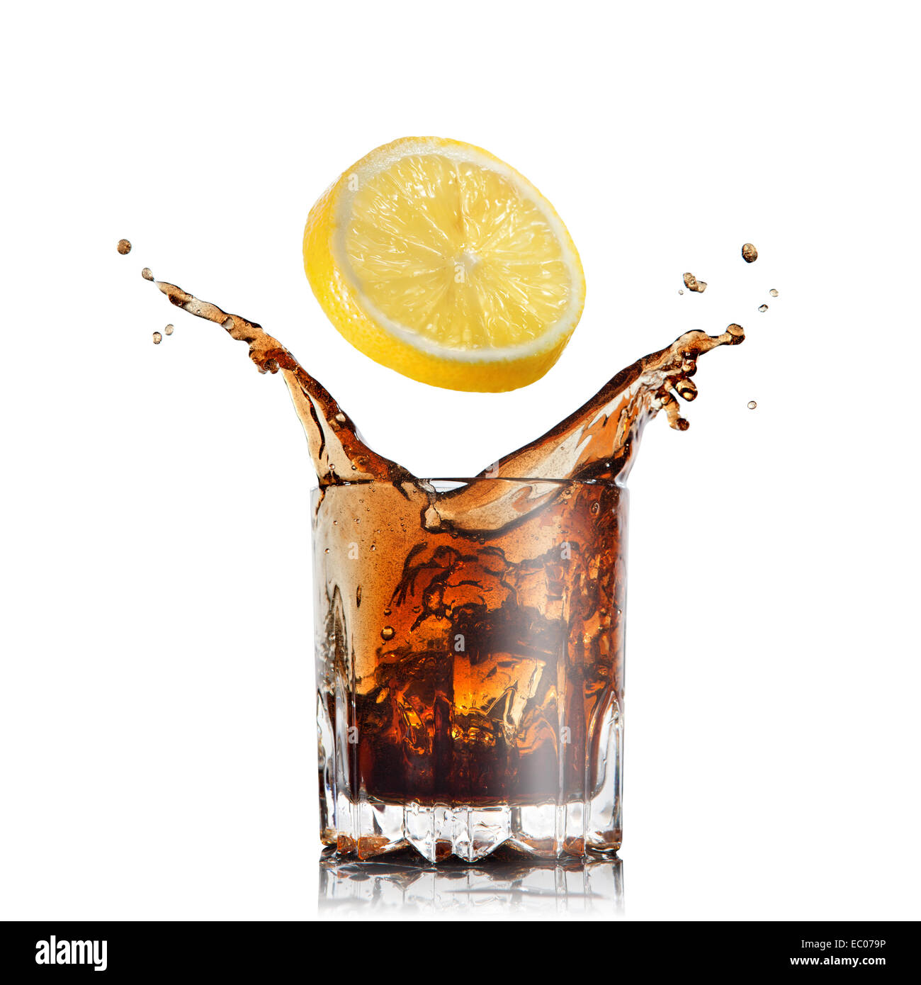 splash of cola in glass with lemon isolated on white Stock Photo - Alamy