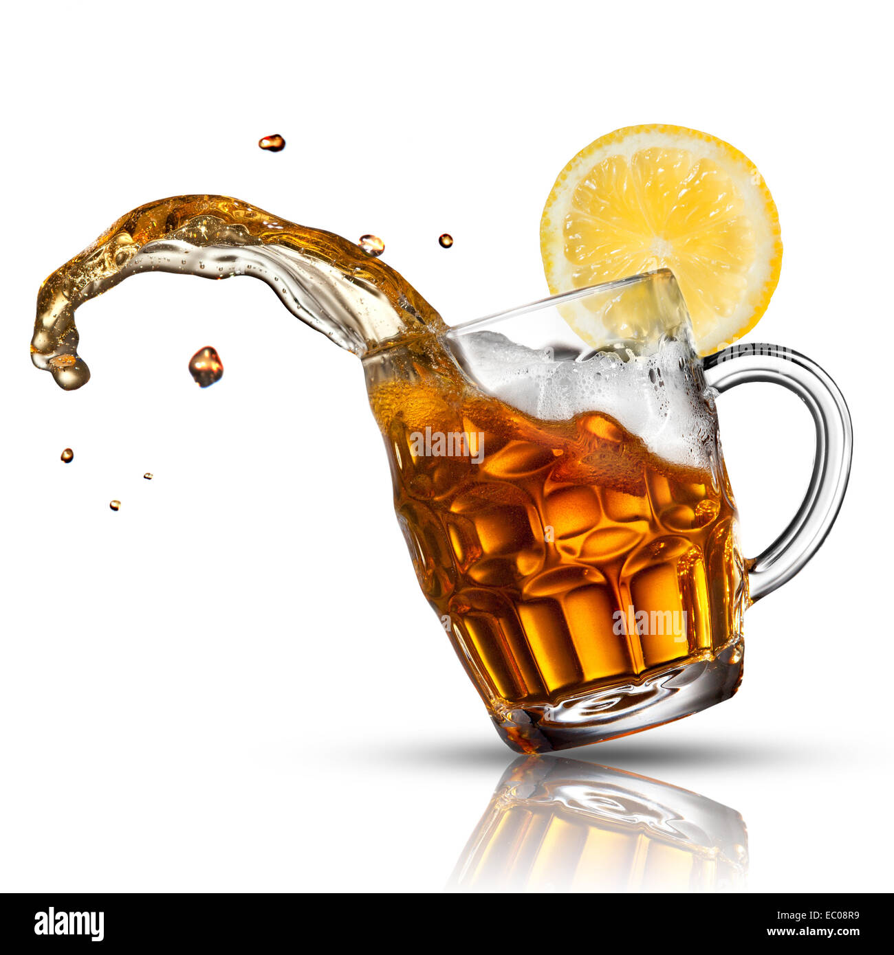 Beer splash in glass with lemon isolated on white Stock Photo - Alamy