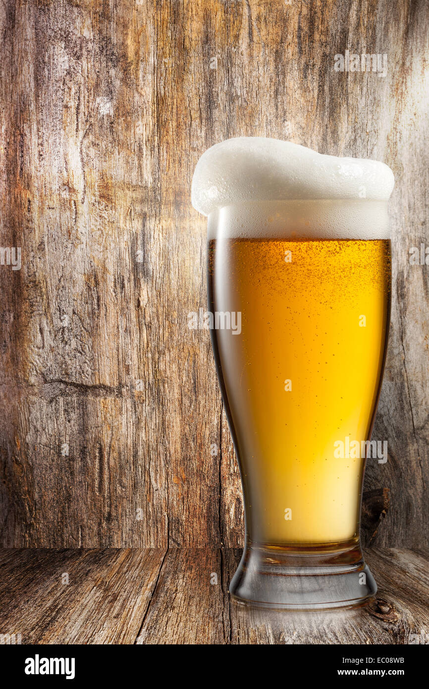 Mug filled beer on wooden hi-res stock photography and images - Alamy