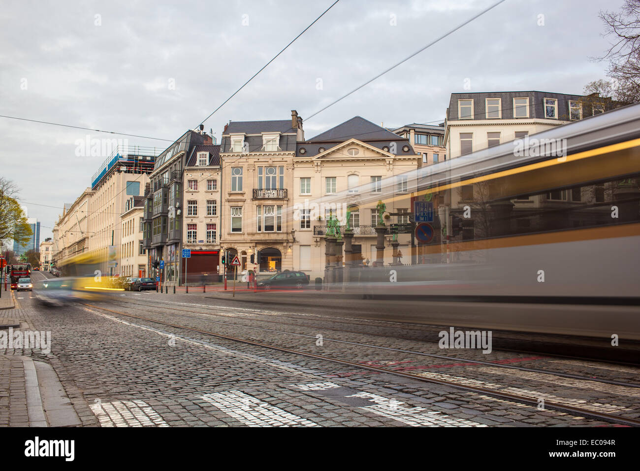 Tramway in motion on the street of Brussels near The Sablon Square ...