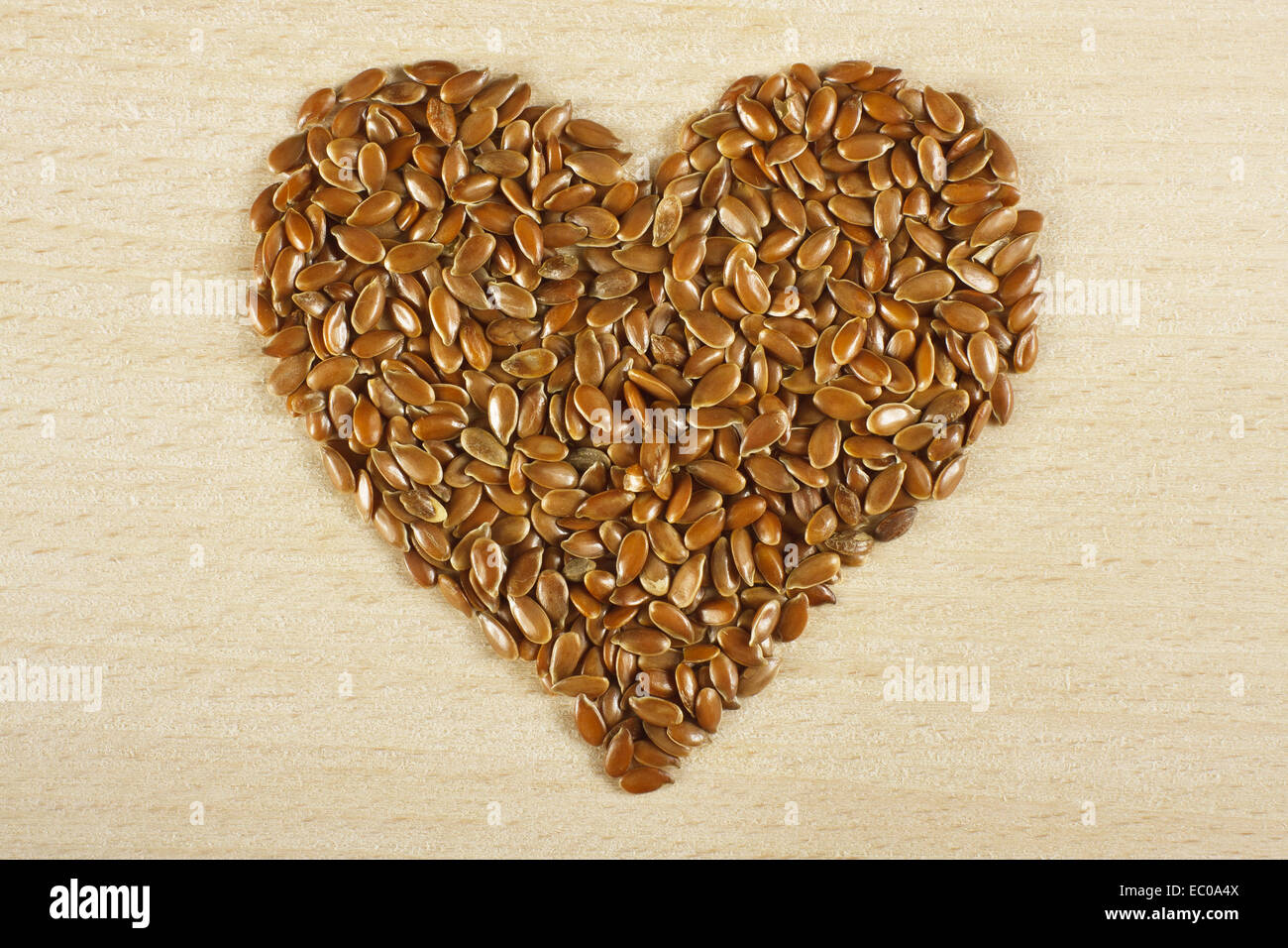 Heart shape made from flax seed Stock Photo - Alamy