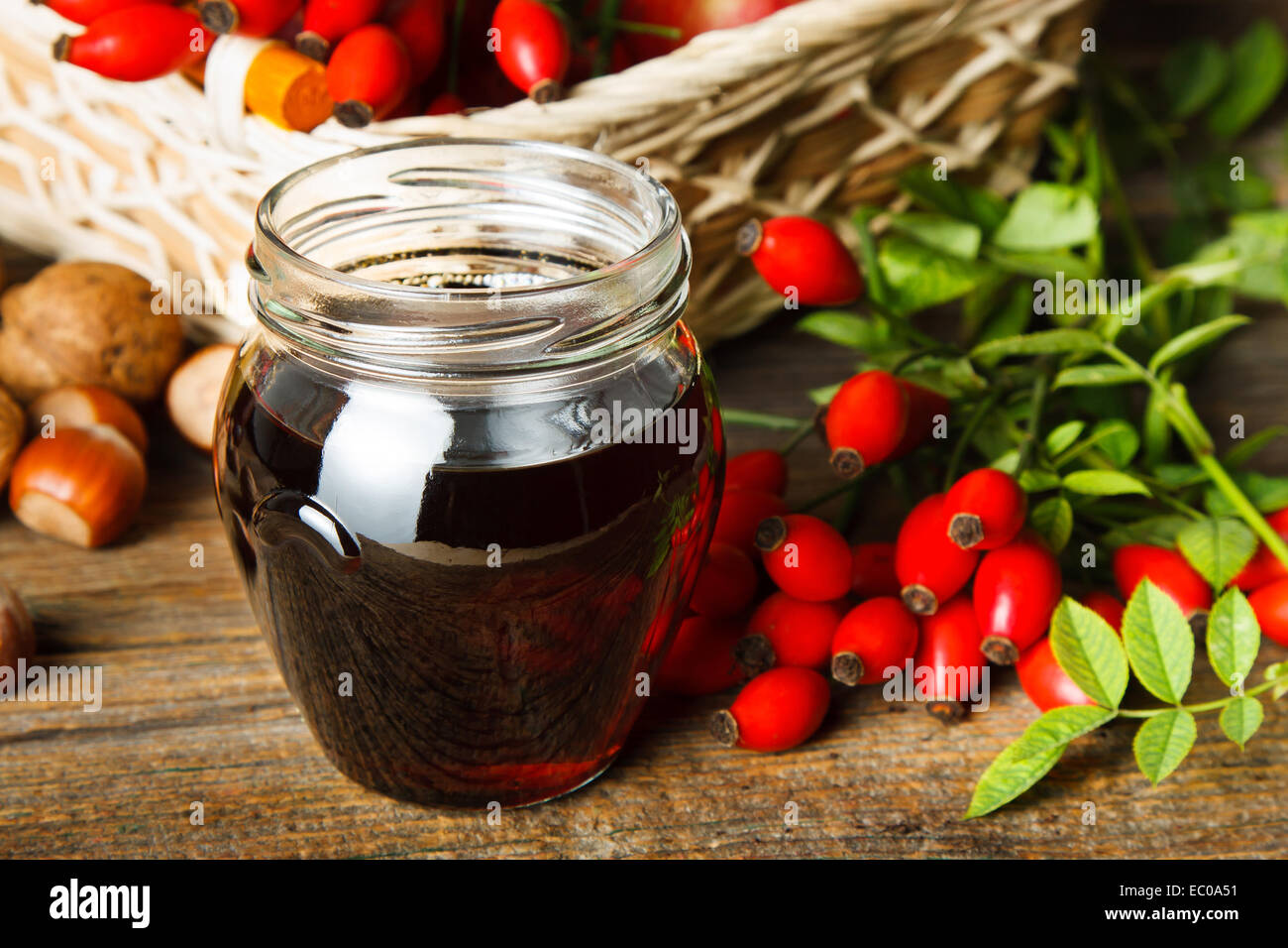 The thick syrup made from rose hips Stock Photo - Alamy