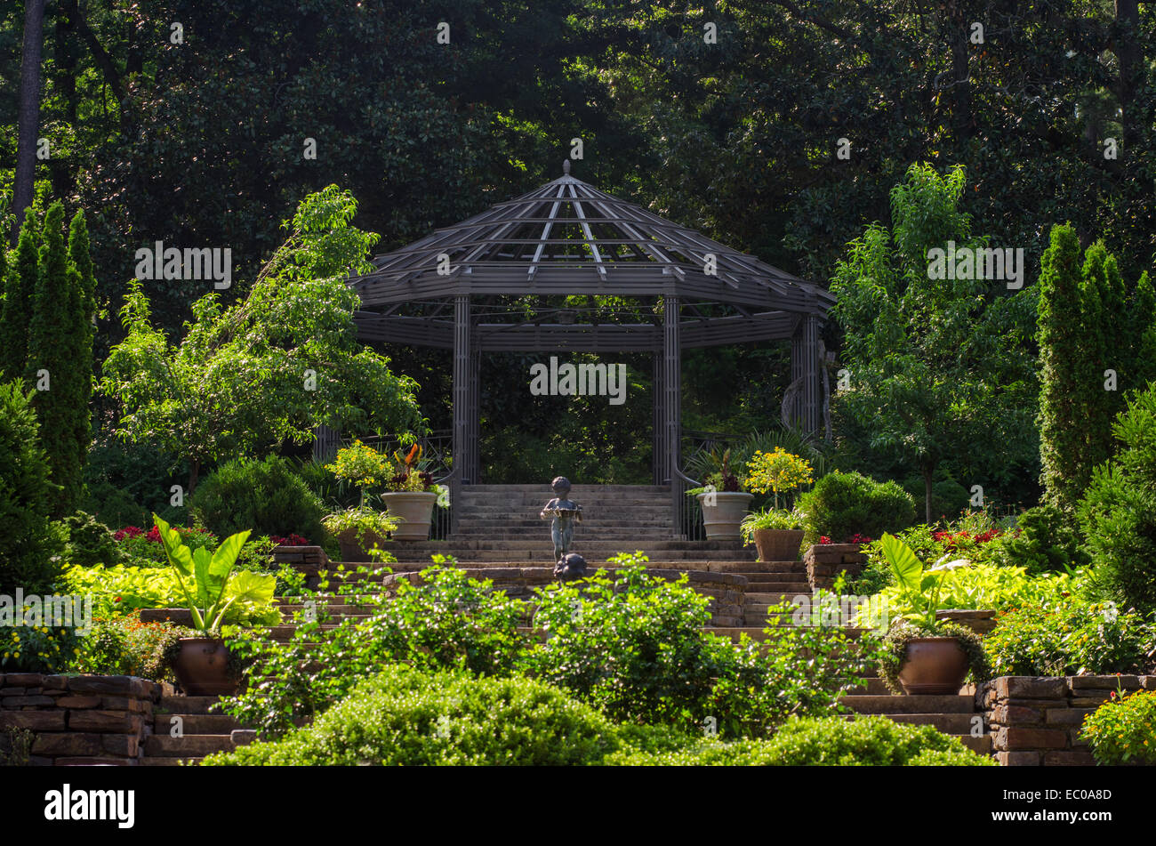 A pergola in an outdoor garden makes the perfect backdrop for a summer ...