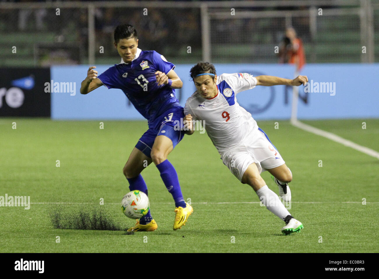 Narubadin Weerawatnodom of Thailand (13) shields the ball from Misagh ...