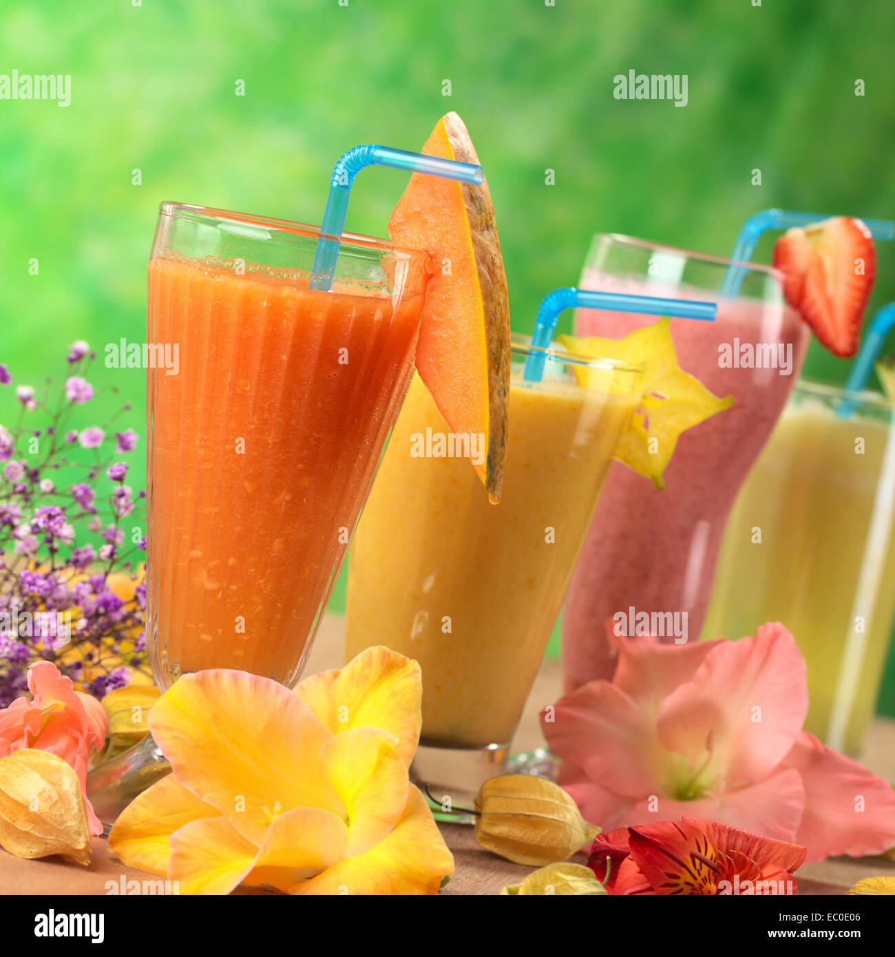 Fresh papaya, mango, strawberry and pineapple fruit juices and ...