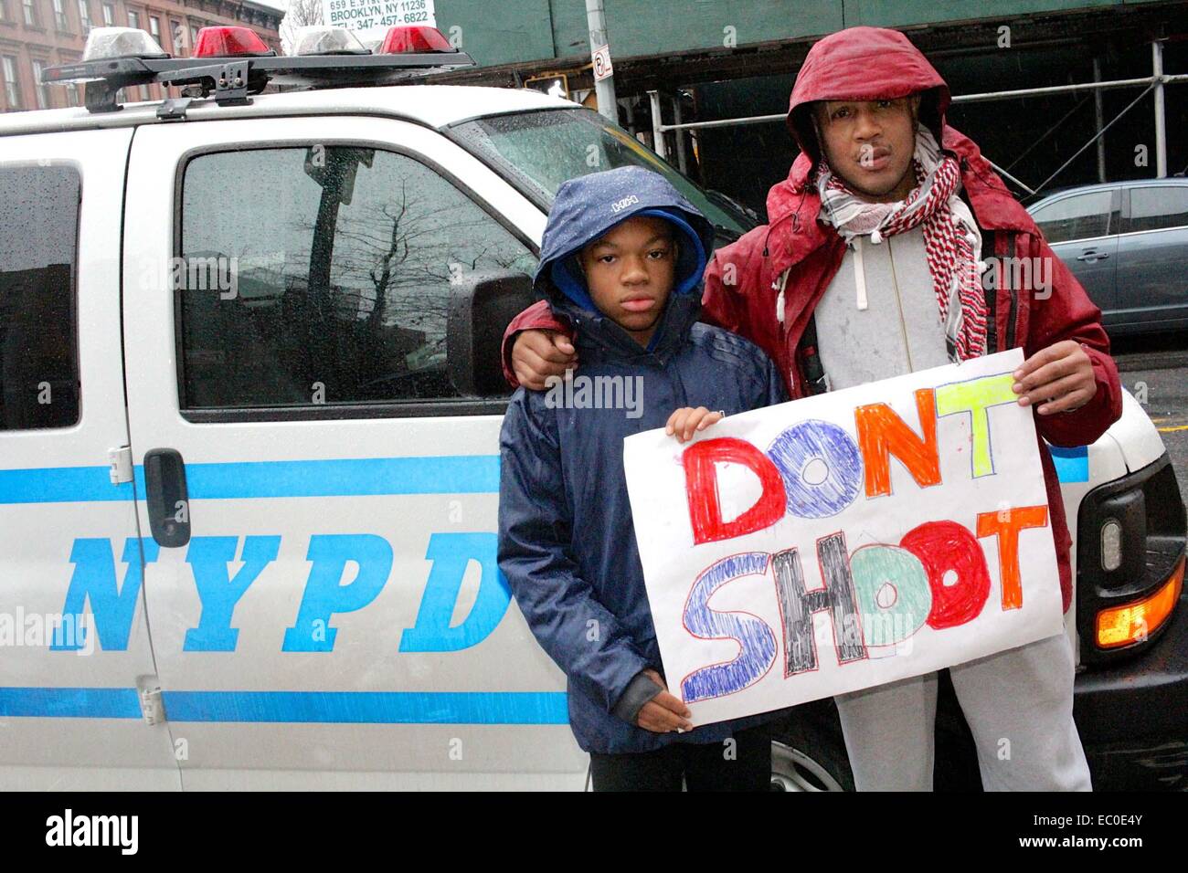New York, New York, USA. 6th Dec, 2014. Amir Sanders, 13, and his ...