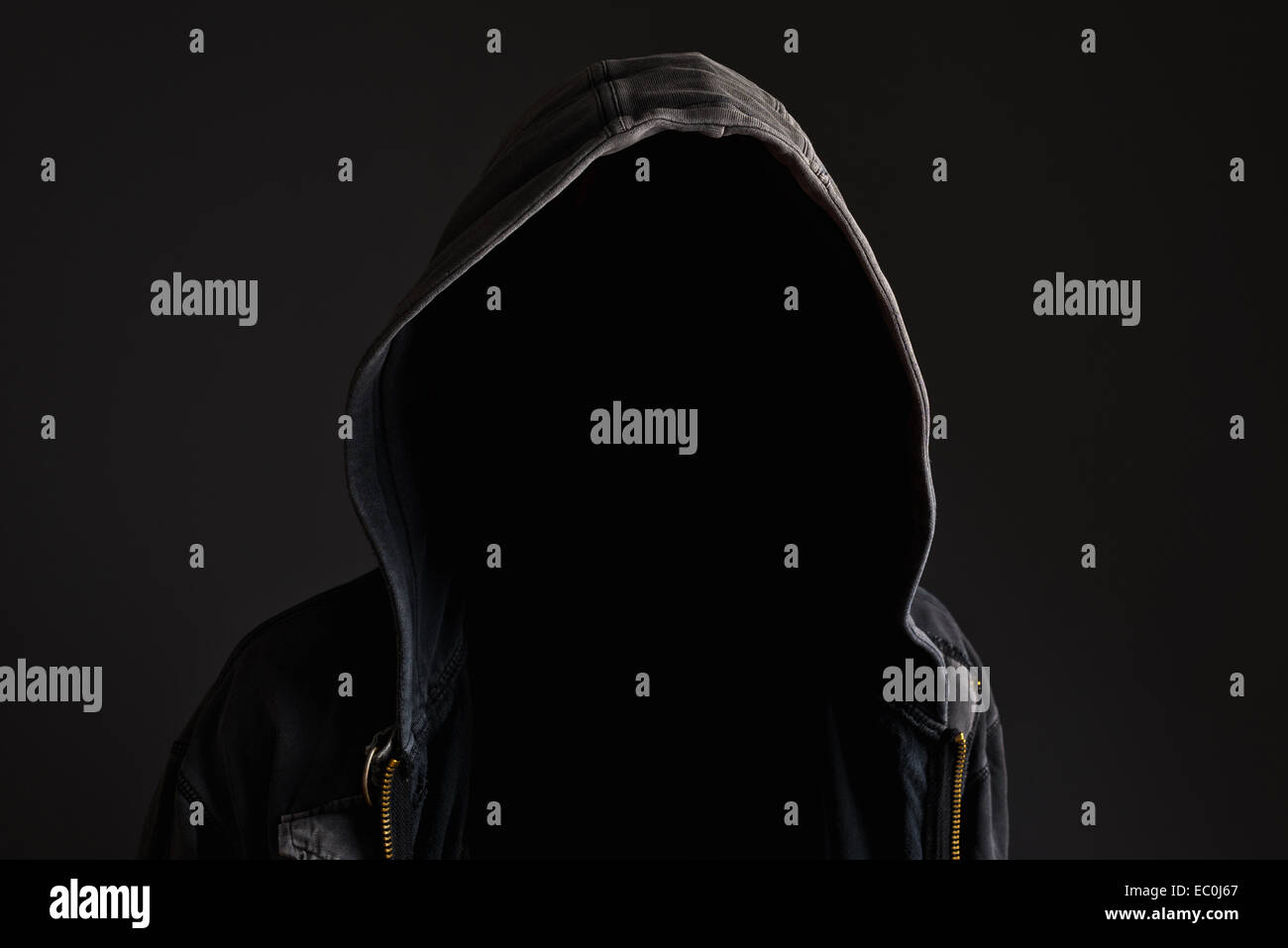 Faceless unknown and unrecognizable man without identity wearing hood ...