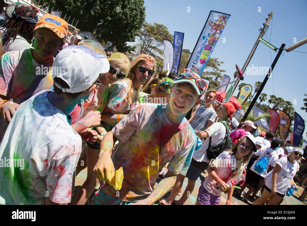 Harare. 7th Dec, 2014. People splash paints onto each other during the ...