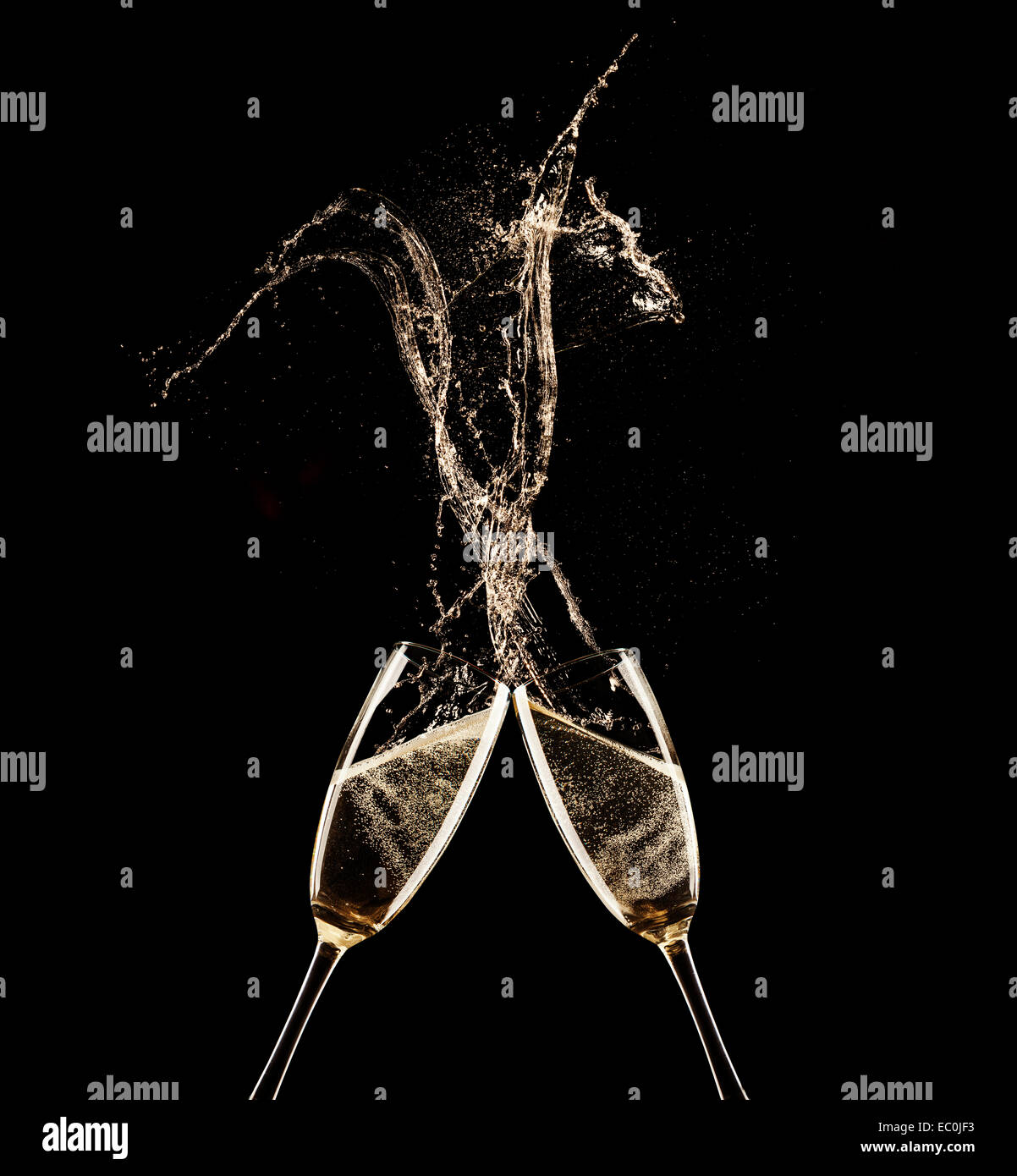 Glasses of champagne with splash, isolated on black background Stock ...