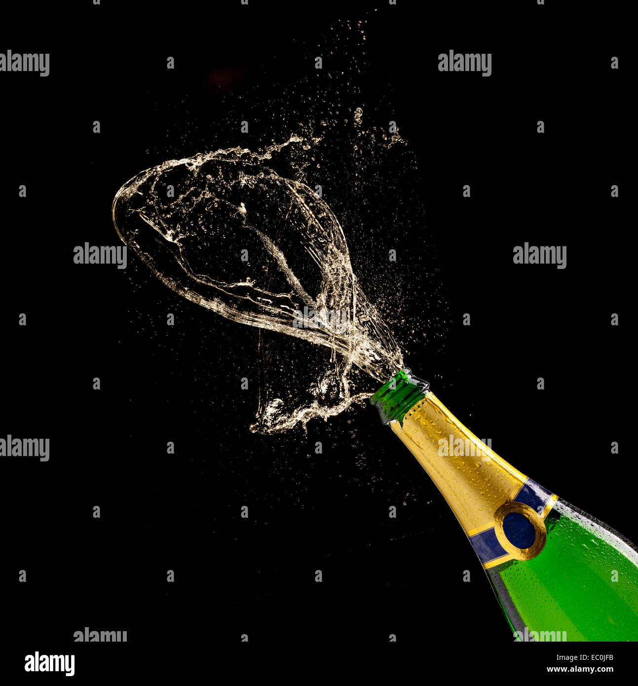 Bottle of champagne with splash isolated on black background Stock ...
