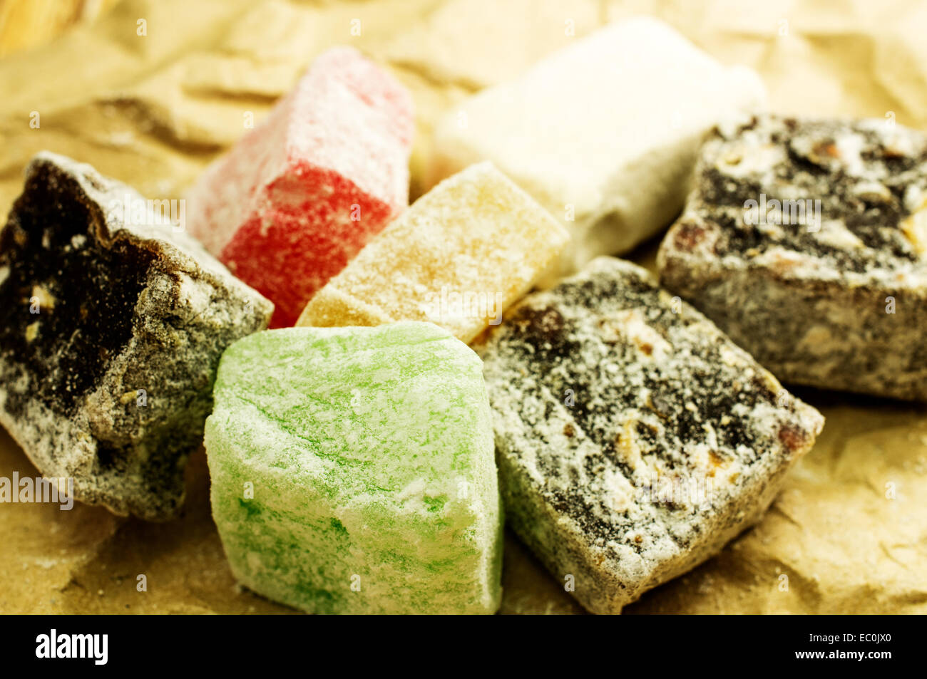 Pieces of colored Turkish Delight on wrapping paper Stock Photo - Alamy
