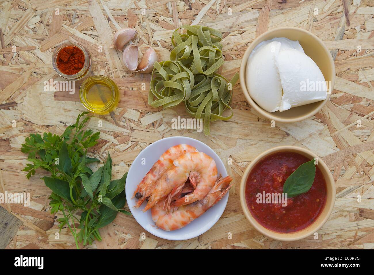Different ingredients for preparing pasta Stock Photo - Alamy