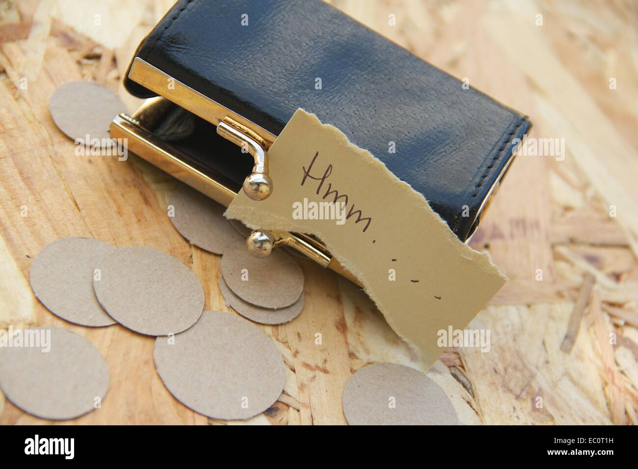 Interjection "Hmm...." on the piece of paper placed close to an empty ...