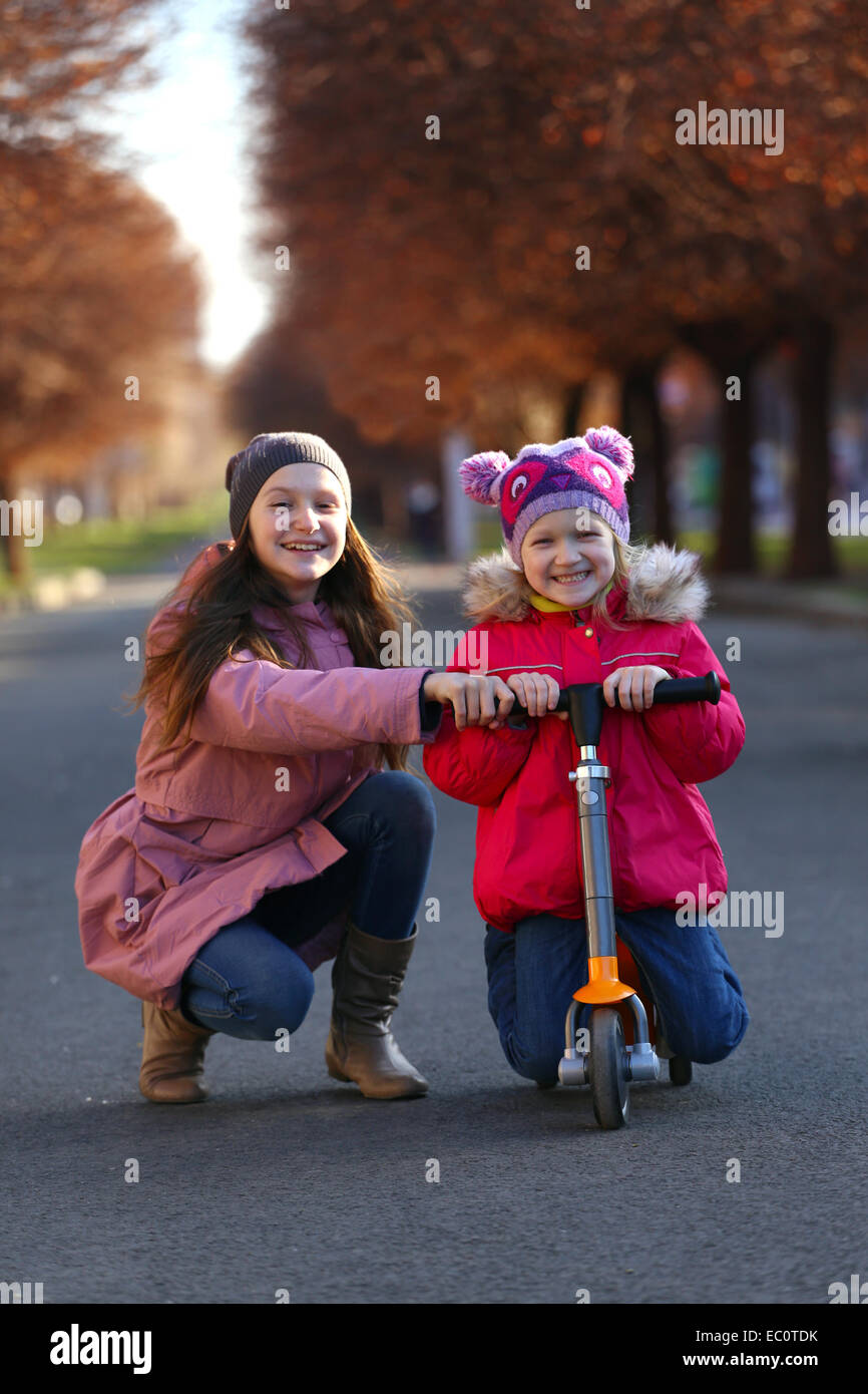 sister girls walking on the street Stock Photo - Alamy