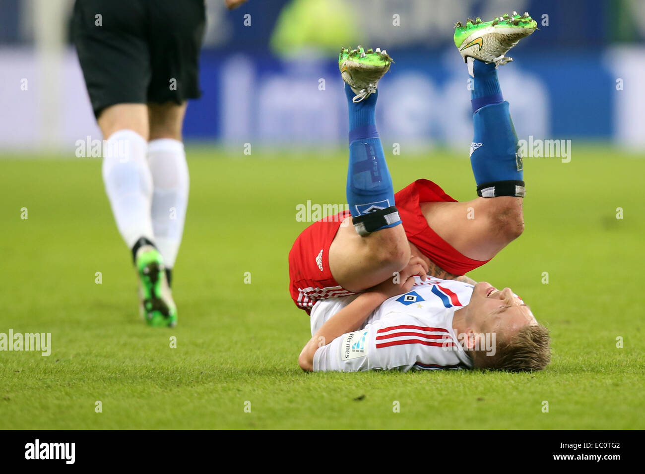 Hamburg, Germany. 07th Dec, 2014. Hamburg's Lewis Holtby lies on the ...