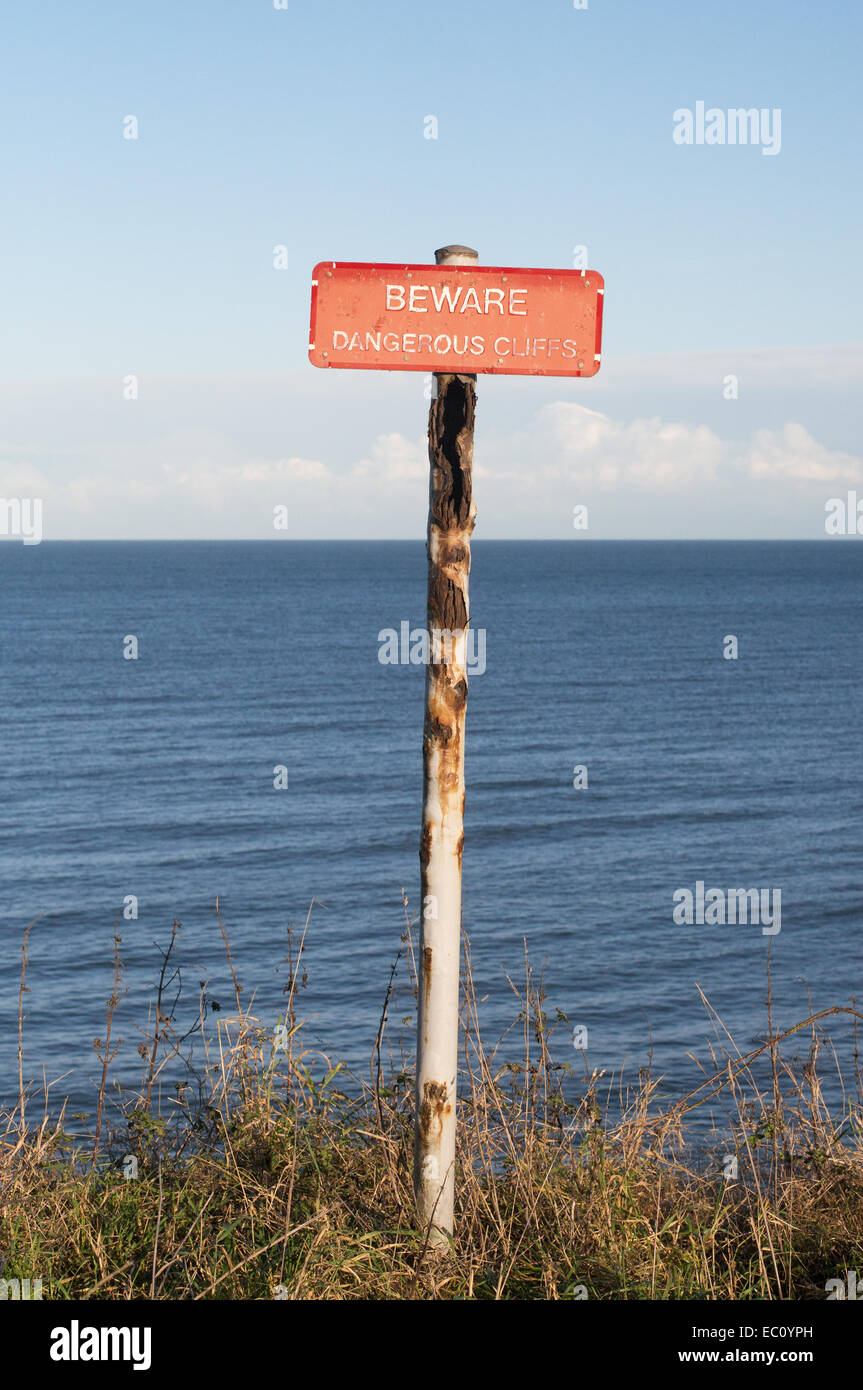Beware Dangerous Cliffs sign Whitley Bay, north east England, UK Stock ...